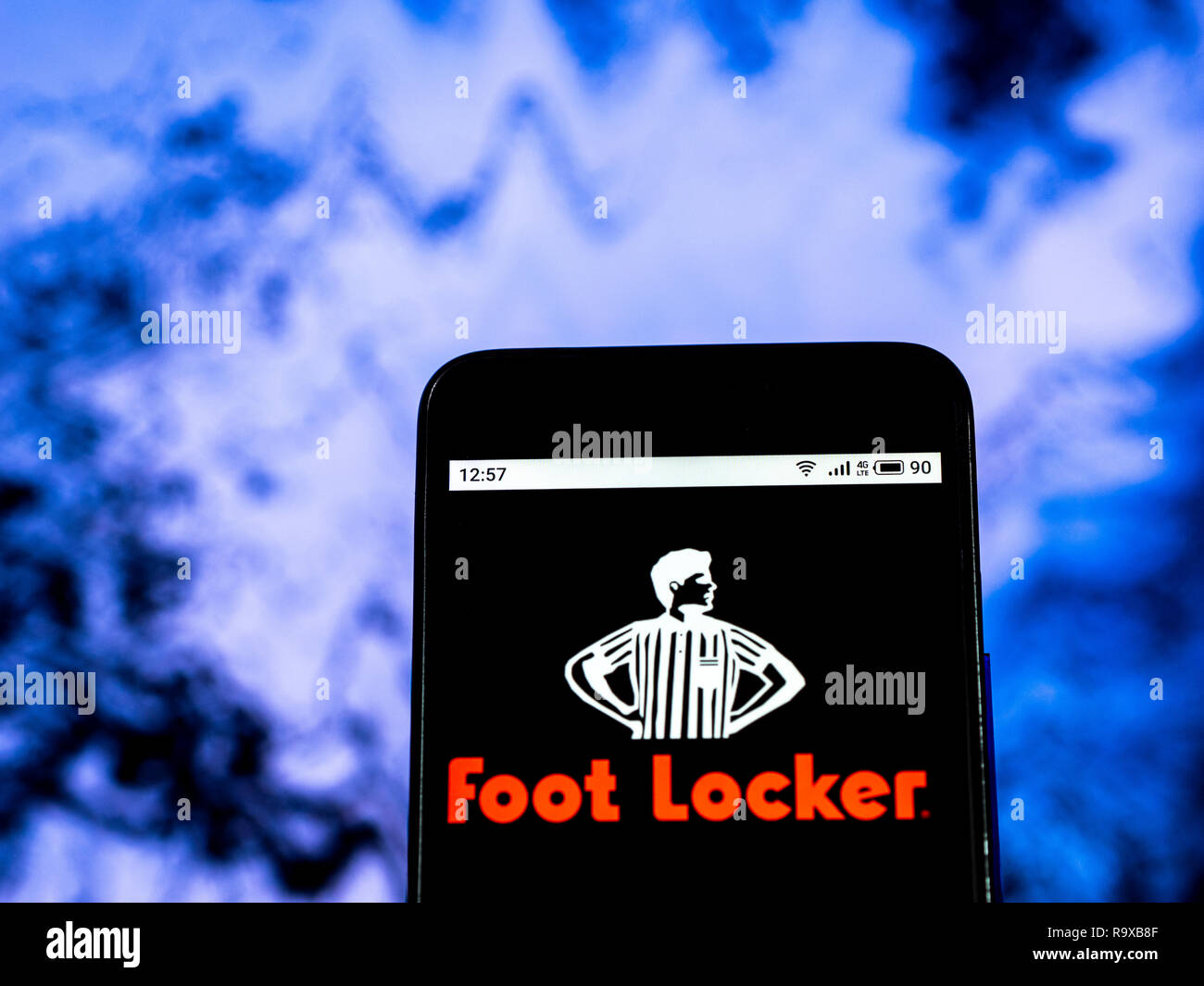 Foot Locker Sportswear company logo seen displayed on smart phone Stock ...
