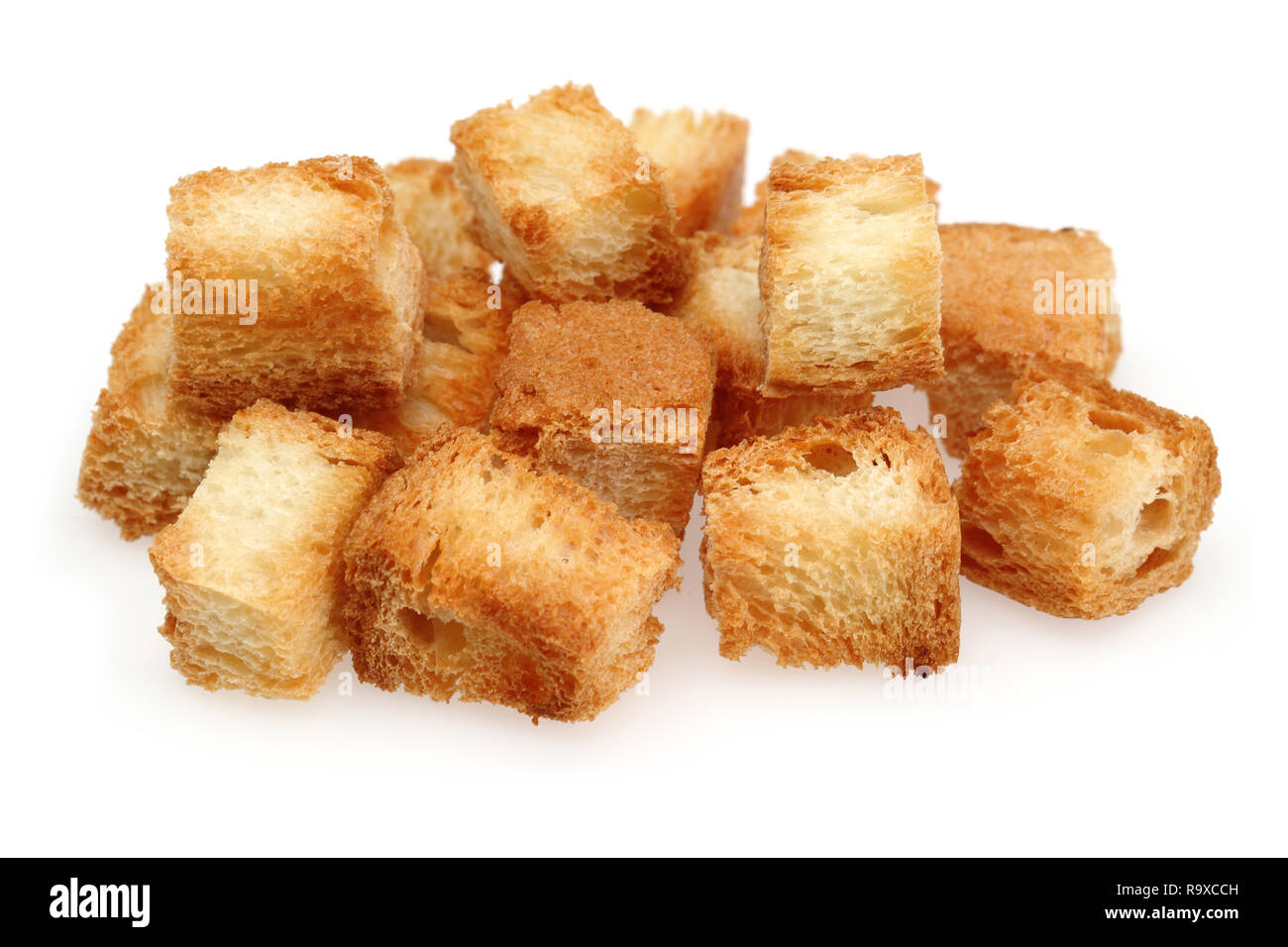 Tiny bread cubes isolated on white background. Macro, studio shot Stock ...