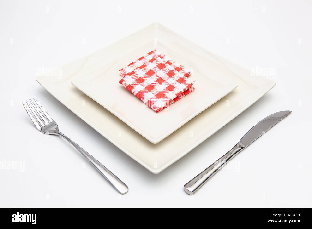 Square table setting hi-res stock photography and images - Alamy
