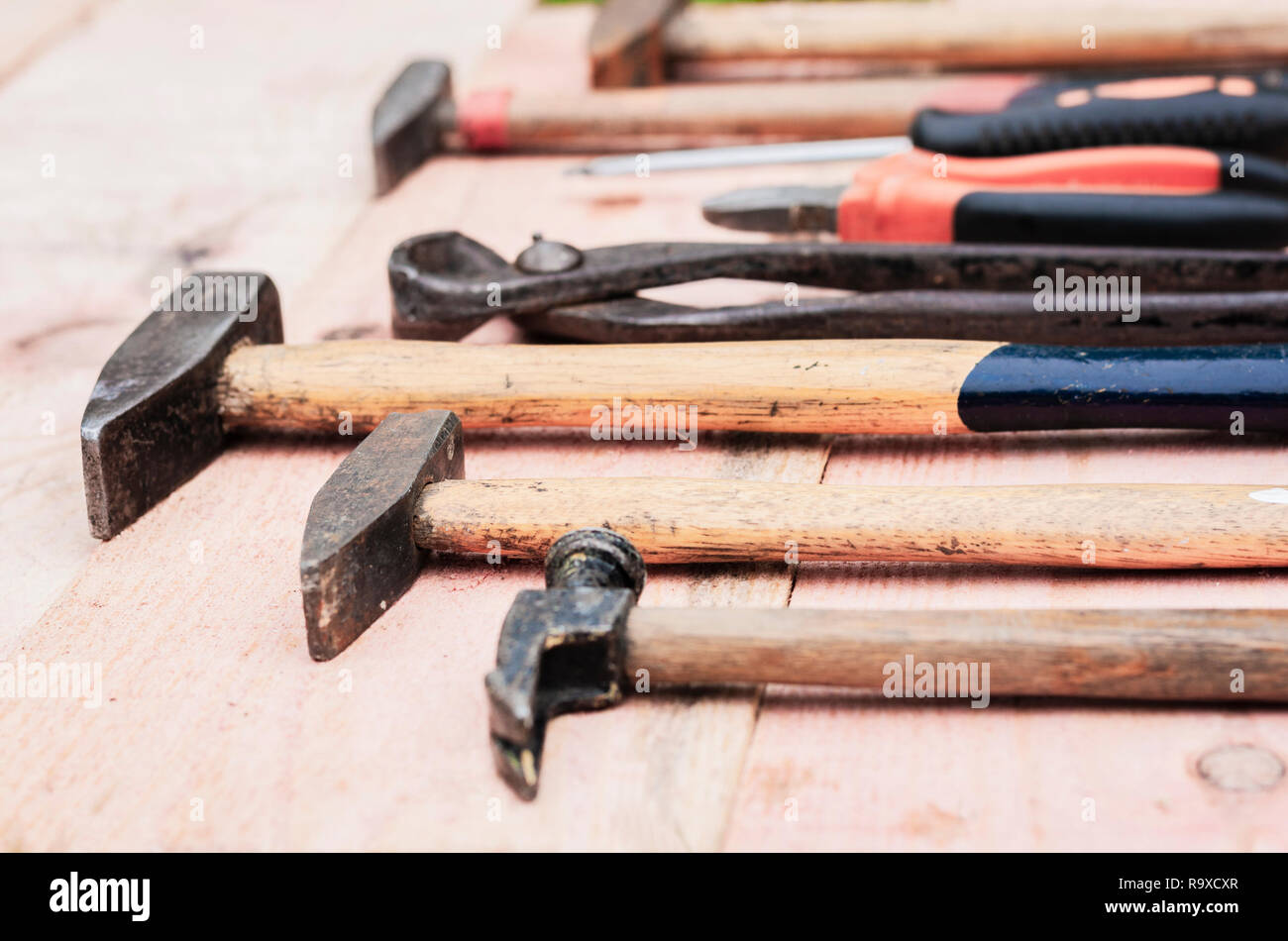 Set of vintage hand construction tools on a wooden background Stock ...