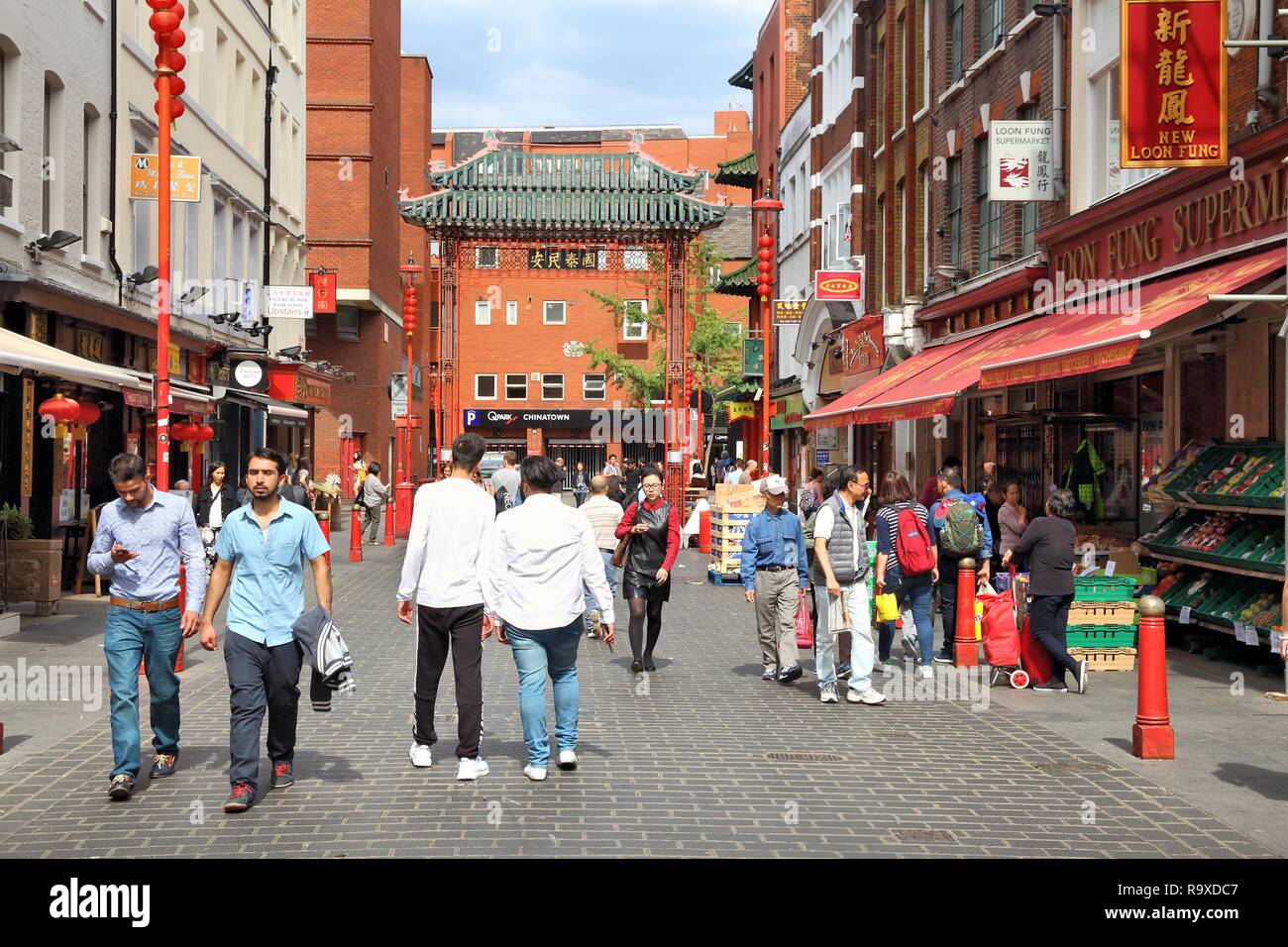 LONDON, UK - JULY 6, 2016: People visit Chinatown district of London ...