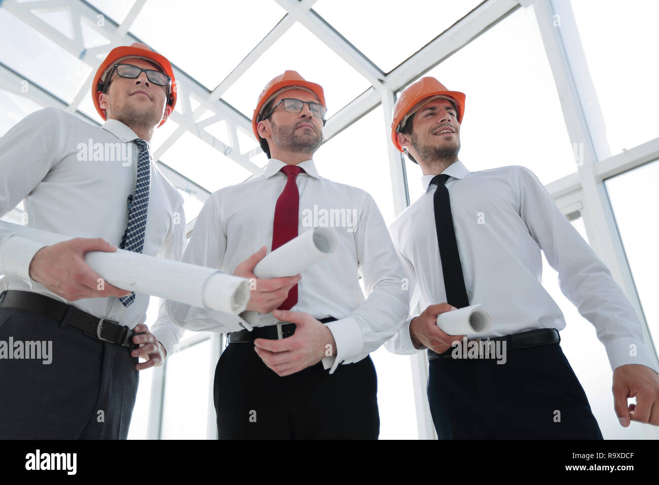 Three builders work together construction hi-res stock photography and ...