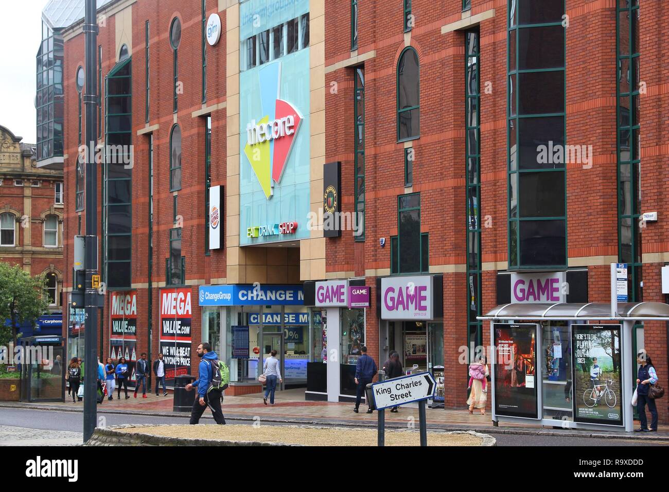 LEEDS, UK - JULY 11, 2016: People walk by The Core shopping mall in ...