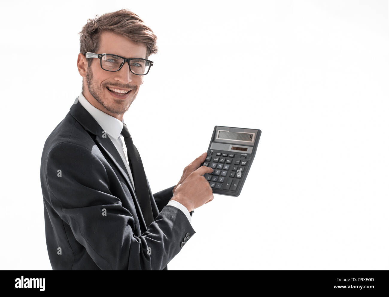Business man holding calculator Cut Out Stock Images & Pictures - Alamy