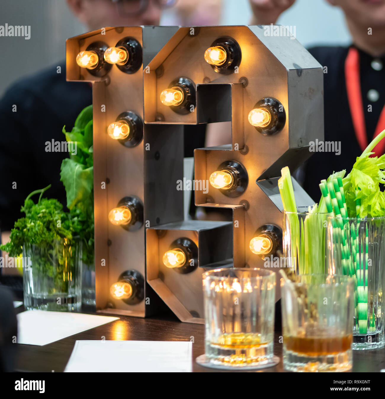 13. Metal letters with lightbulbs and two almost empty glasses of ...