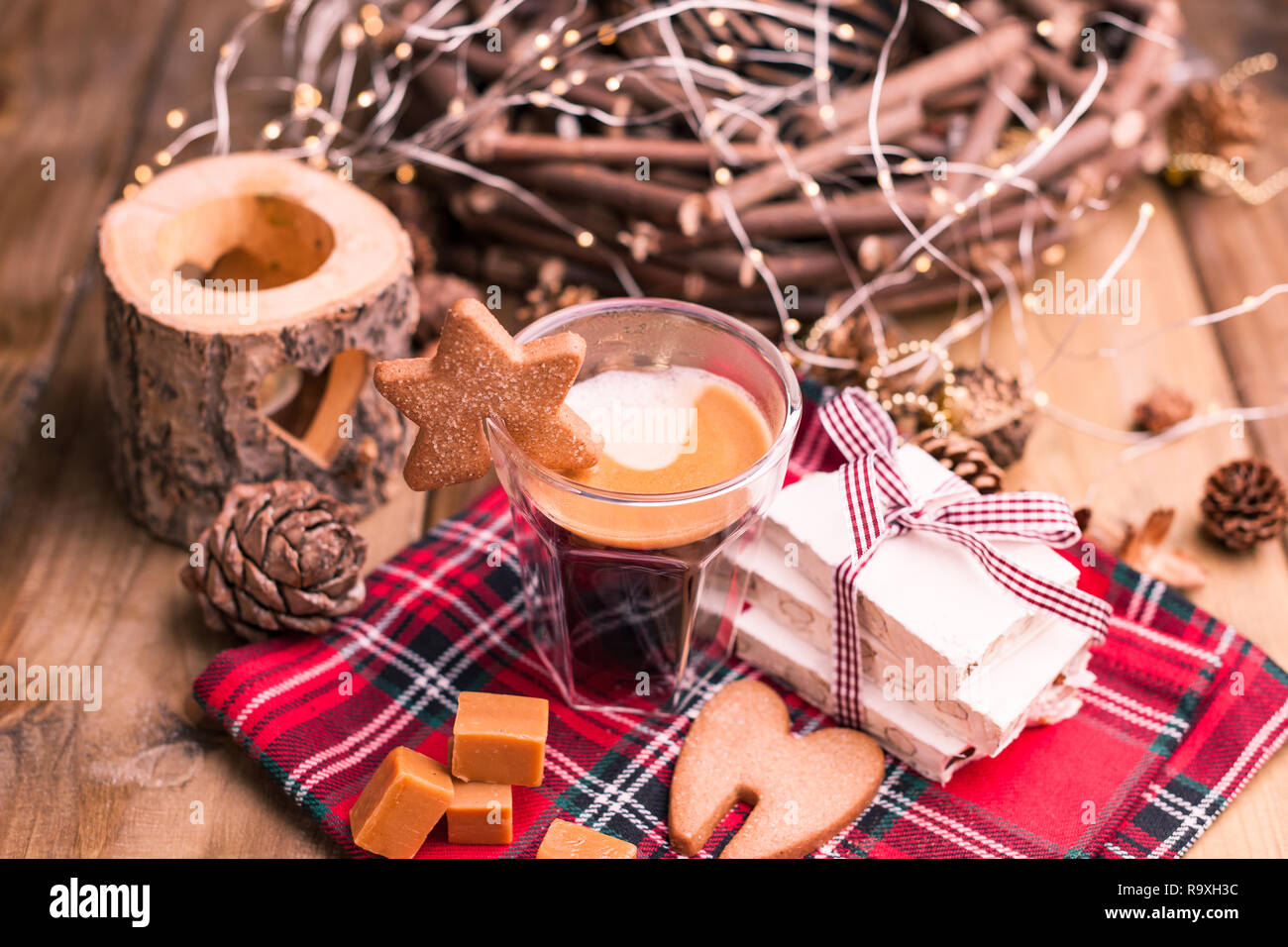 Fresh aromatic coffee and Italian Christmas sweets. Nougat with almonds ...