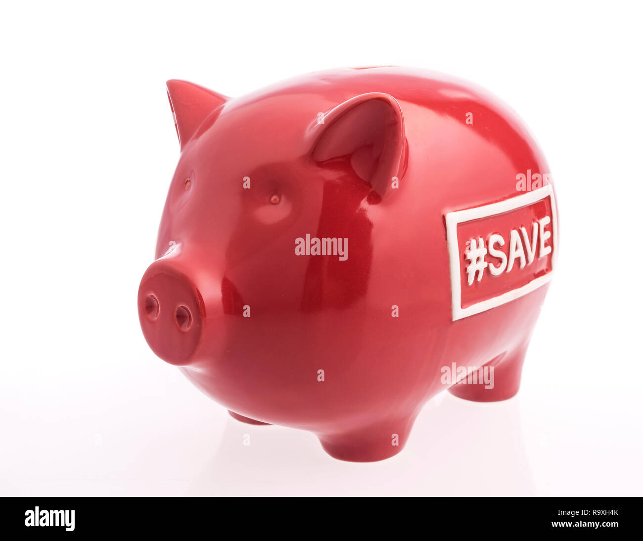 red piggy bank isolated on white background Stock Photo - Alamy