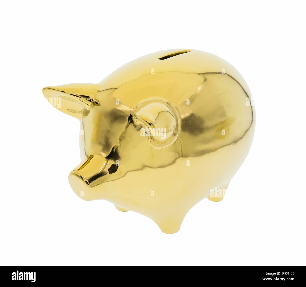 gold piggy bank isolated on white background Stock Photo - Alamy