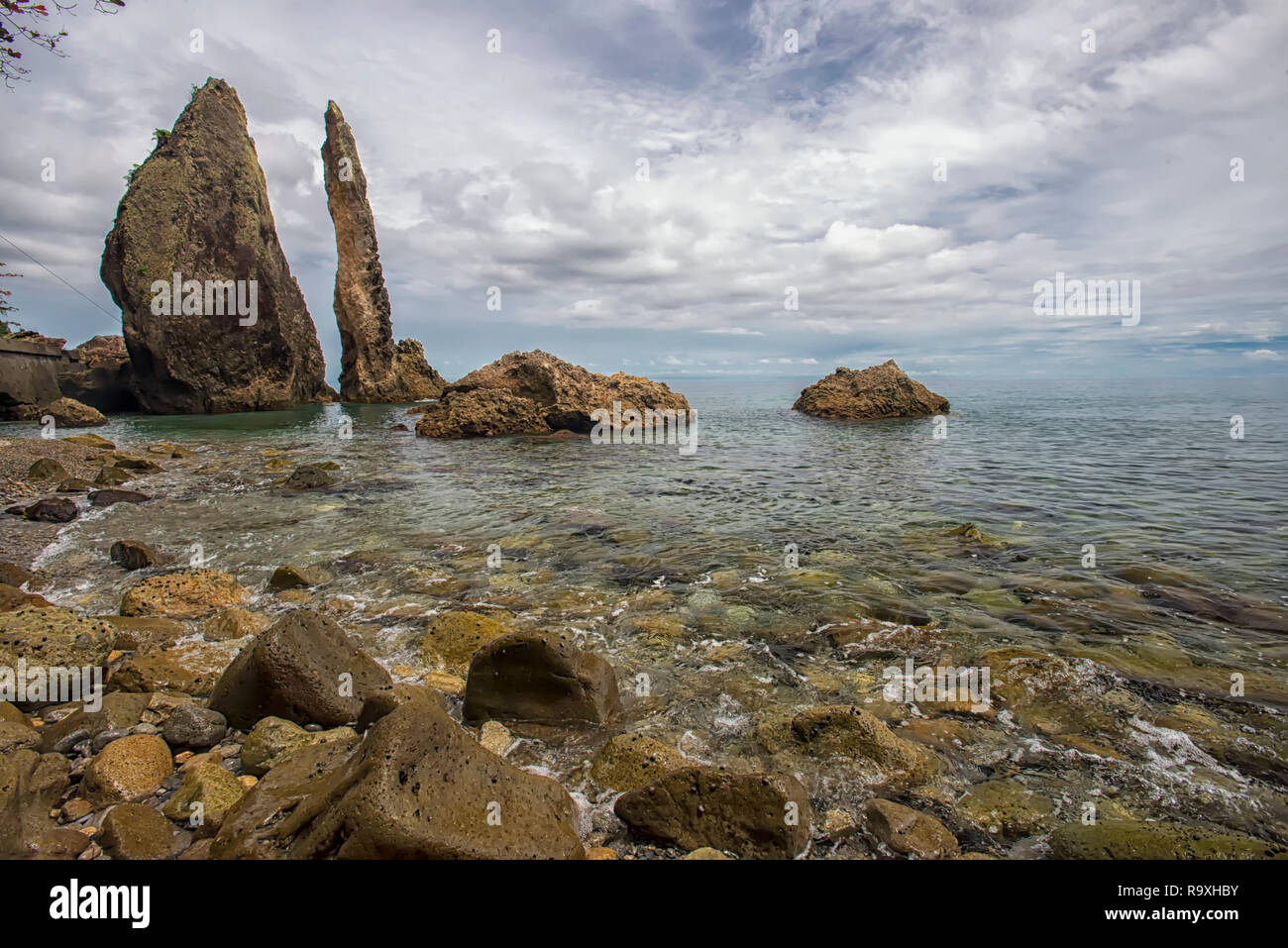 Batu Layar Beach Stock Photo - Alamy
