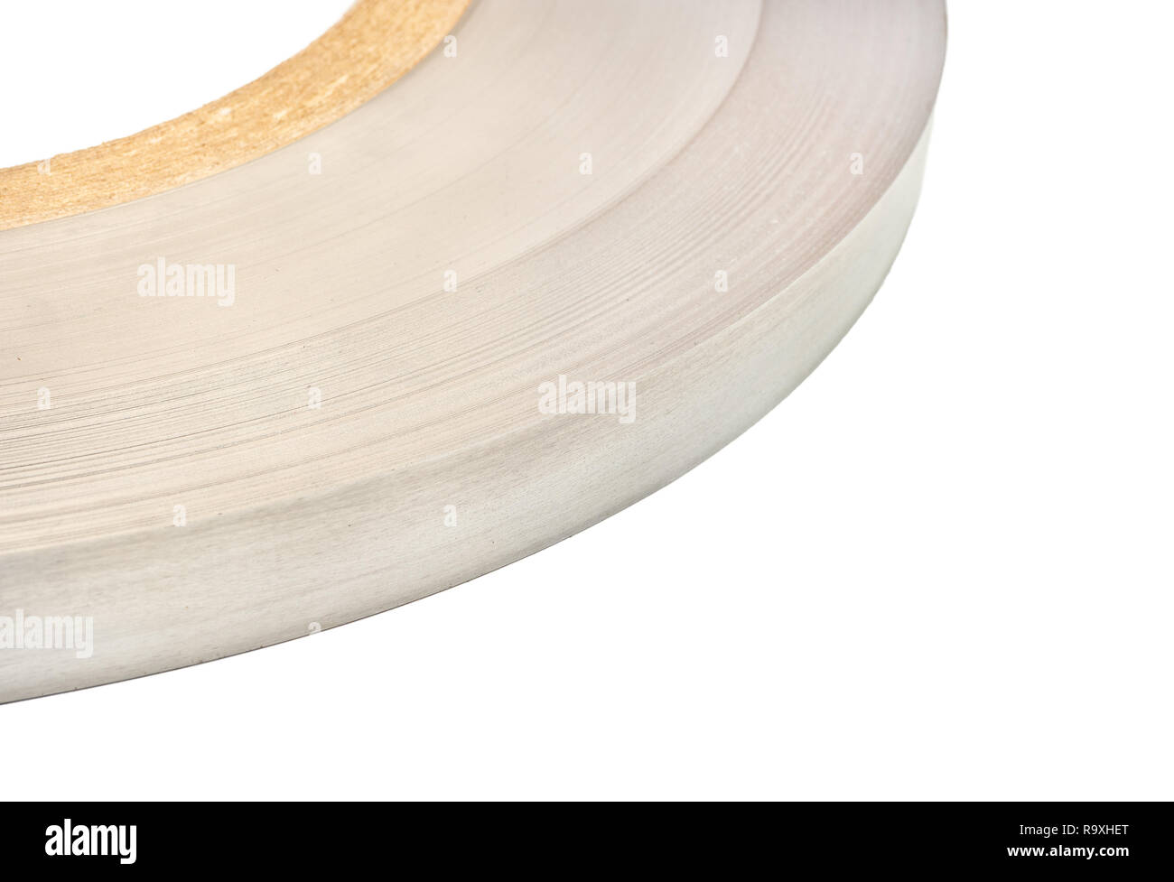Part of round coil metal tape on white background close-up Stock Photo ...