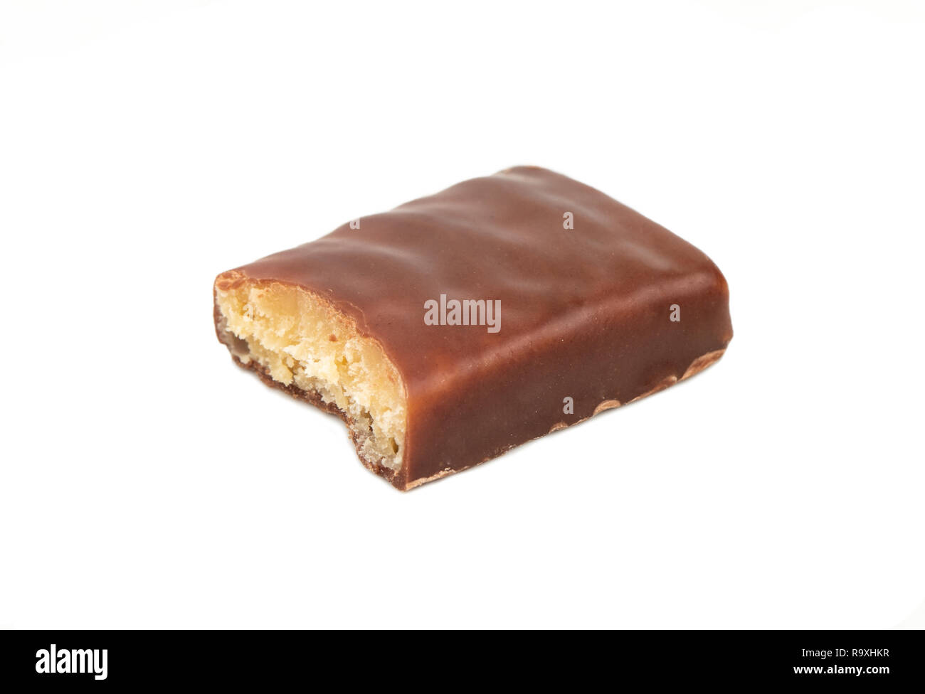 Bitten chocolate candy isolated on white background Stock Photo - Alamy