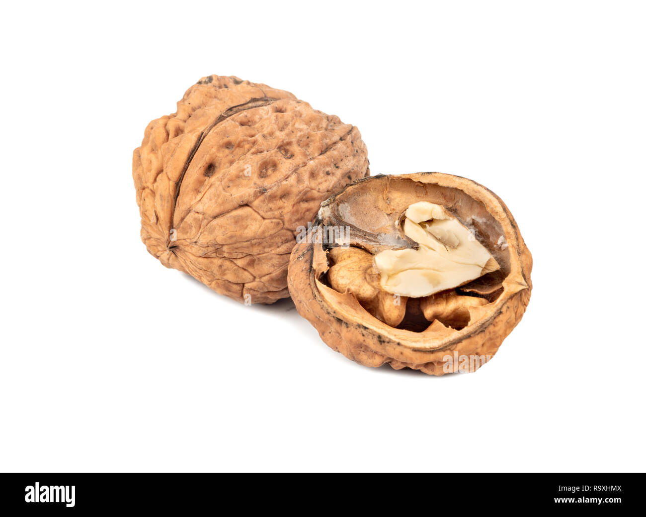 Dry walnut with half isolated on white background Stock Photo - Alamy