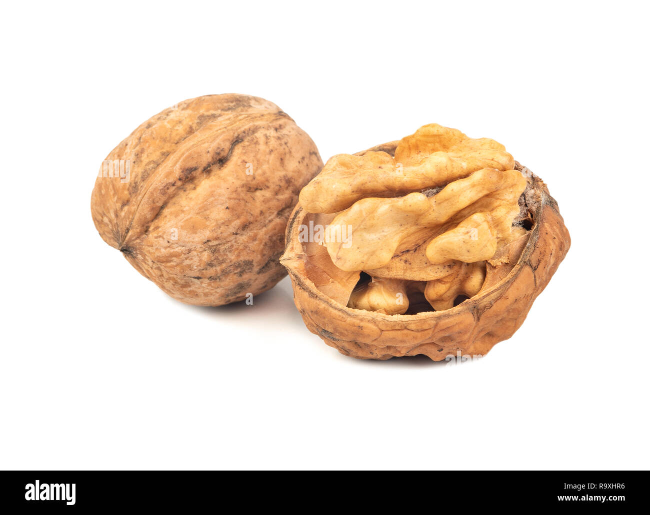 Dry walnut with half isolated on white background Stock Photo - Alamy