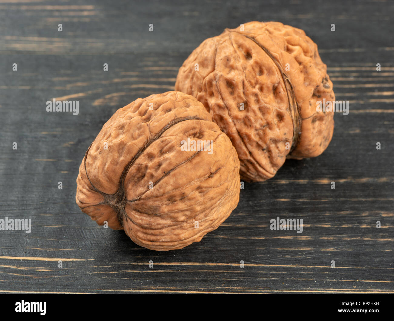Two walnut in shell hi-res stock photography and images - Alamy