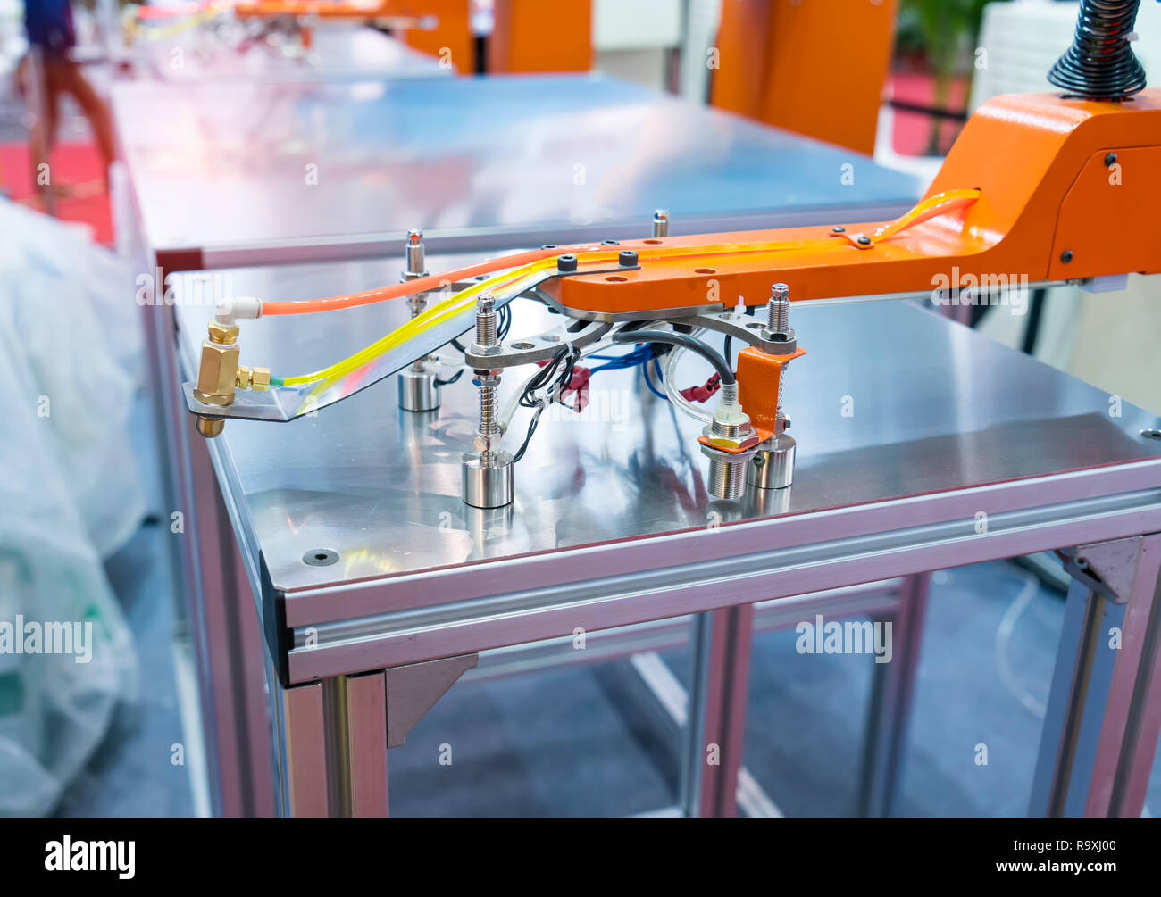 robotic and pneumatic piston sucker unit on industrial machine ...