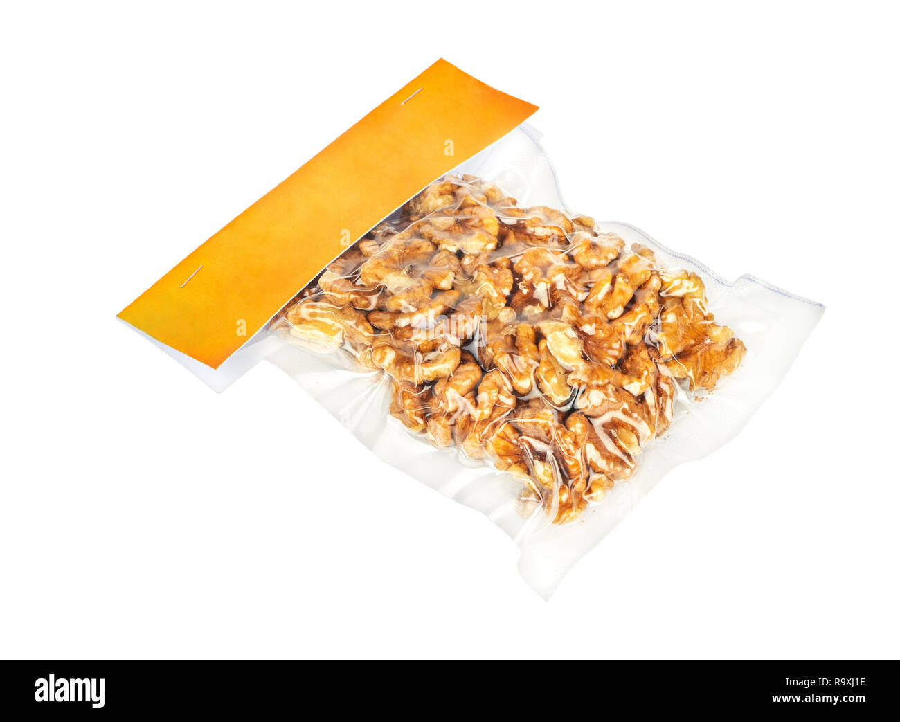 Dry walnuts without shell in vacuum package on white background Stock ...