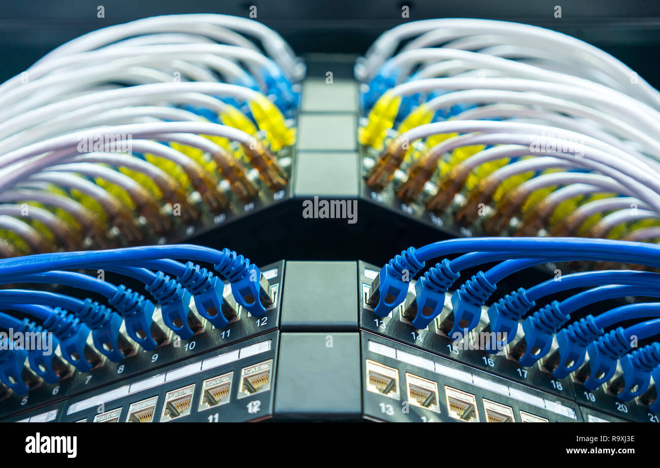 network cables and hub closeup with fiber optical background Stock ...