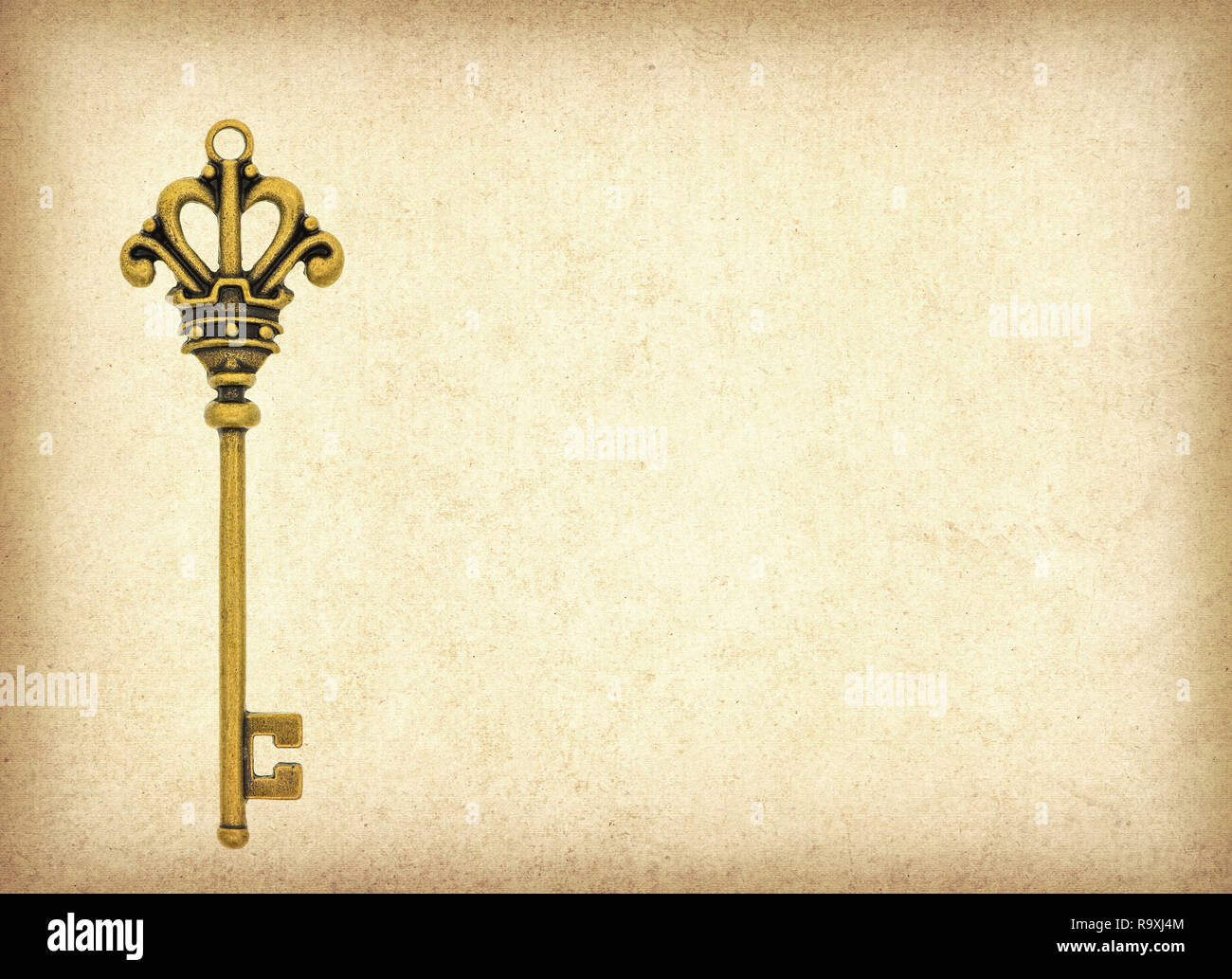 old key on the old textured paper Stock Photo - Alamy