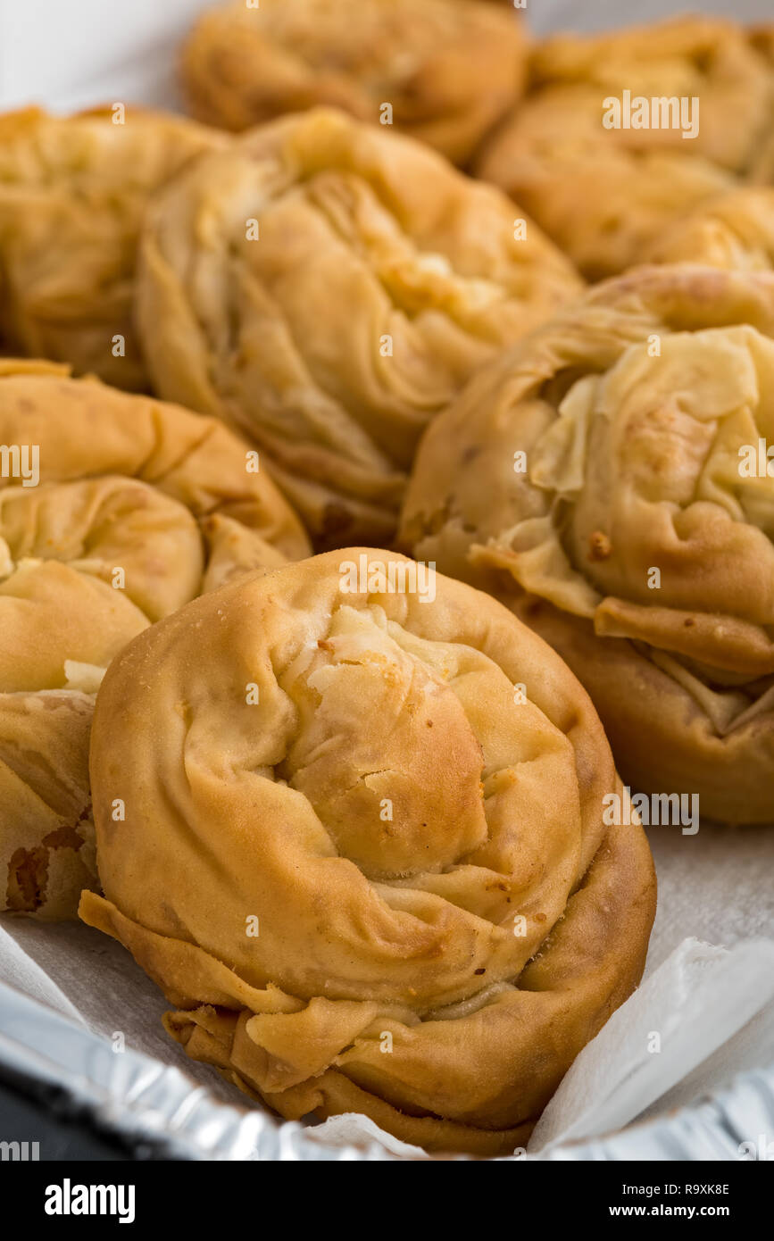 Baked homemade traditional Greek cheese pies Stock Photo - Alamy