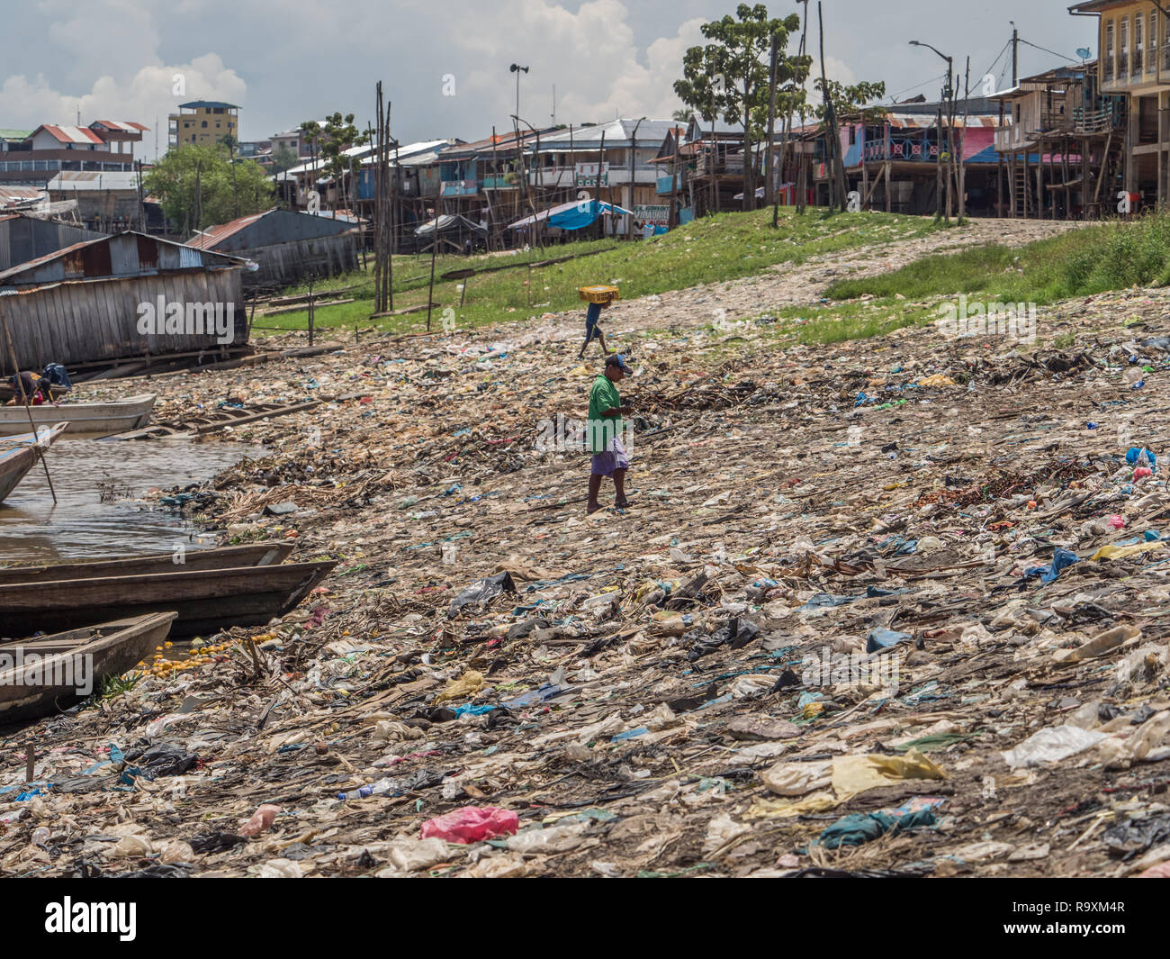 Iquitos, Peru - Sep 25, 2018: A huge pollution on the bank of the Itaya ...