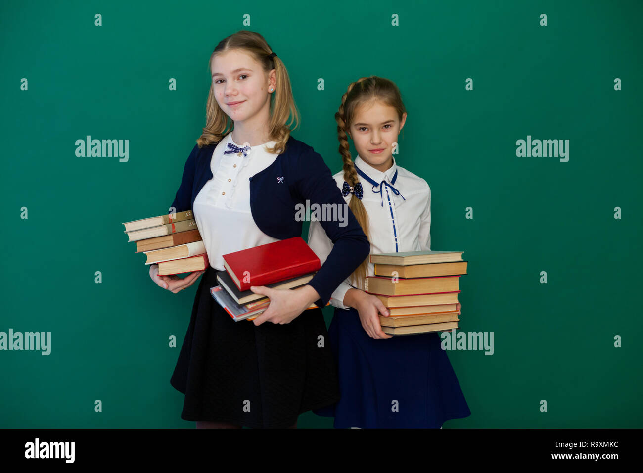 girls at school in the classroom for books of knowledge Stock Photo - Alamy