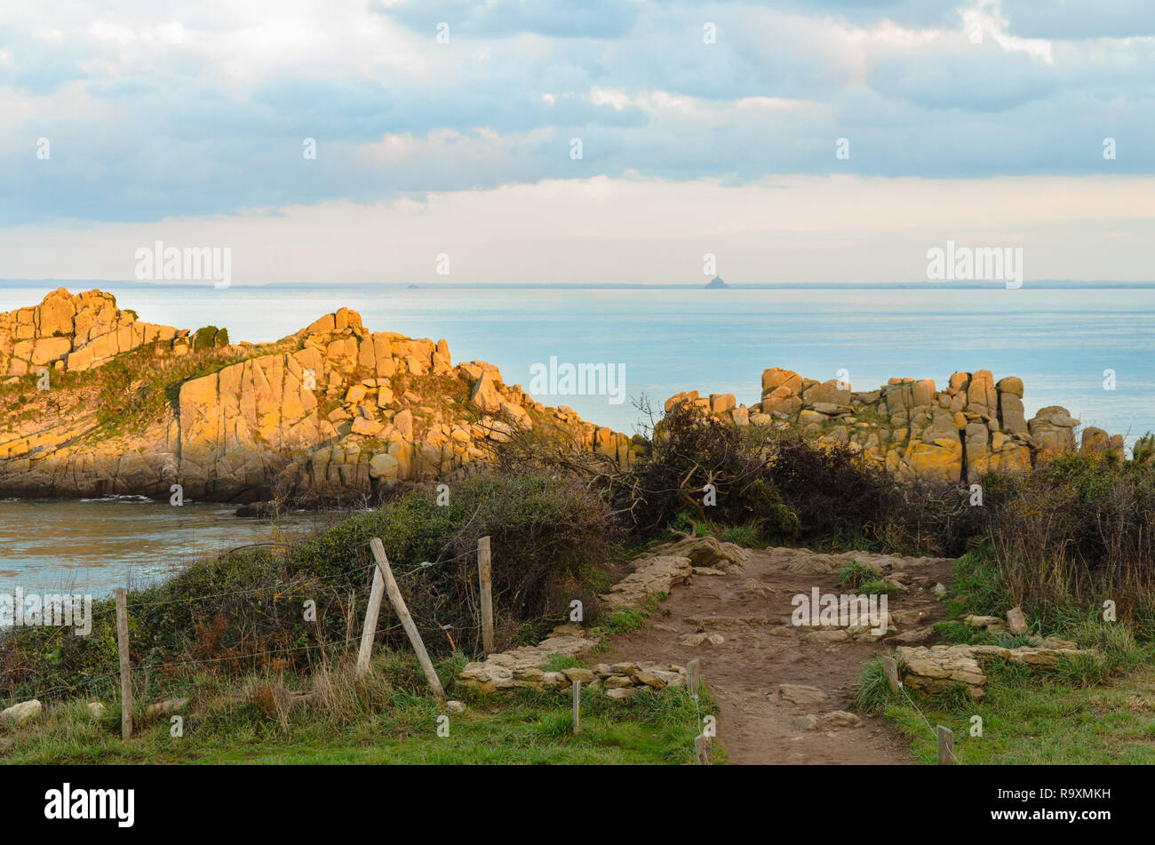 Path to cliffs with Mont Saint Michel in the distance, rocks ...