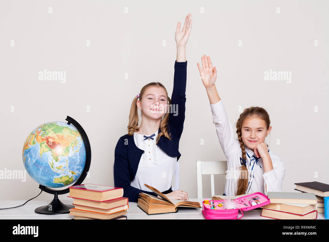 girls at school in the classroom for books of knowledge Stock Photo - Alamy