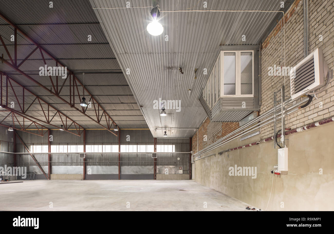 Hangar for storage. Industrial warehouse Stock Photo - Alamy