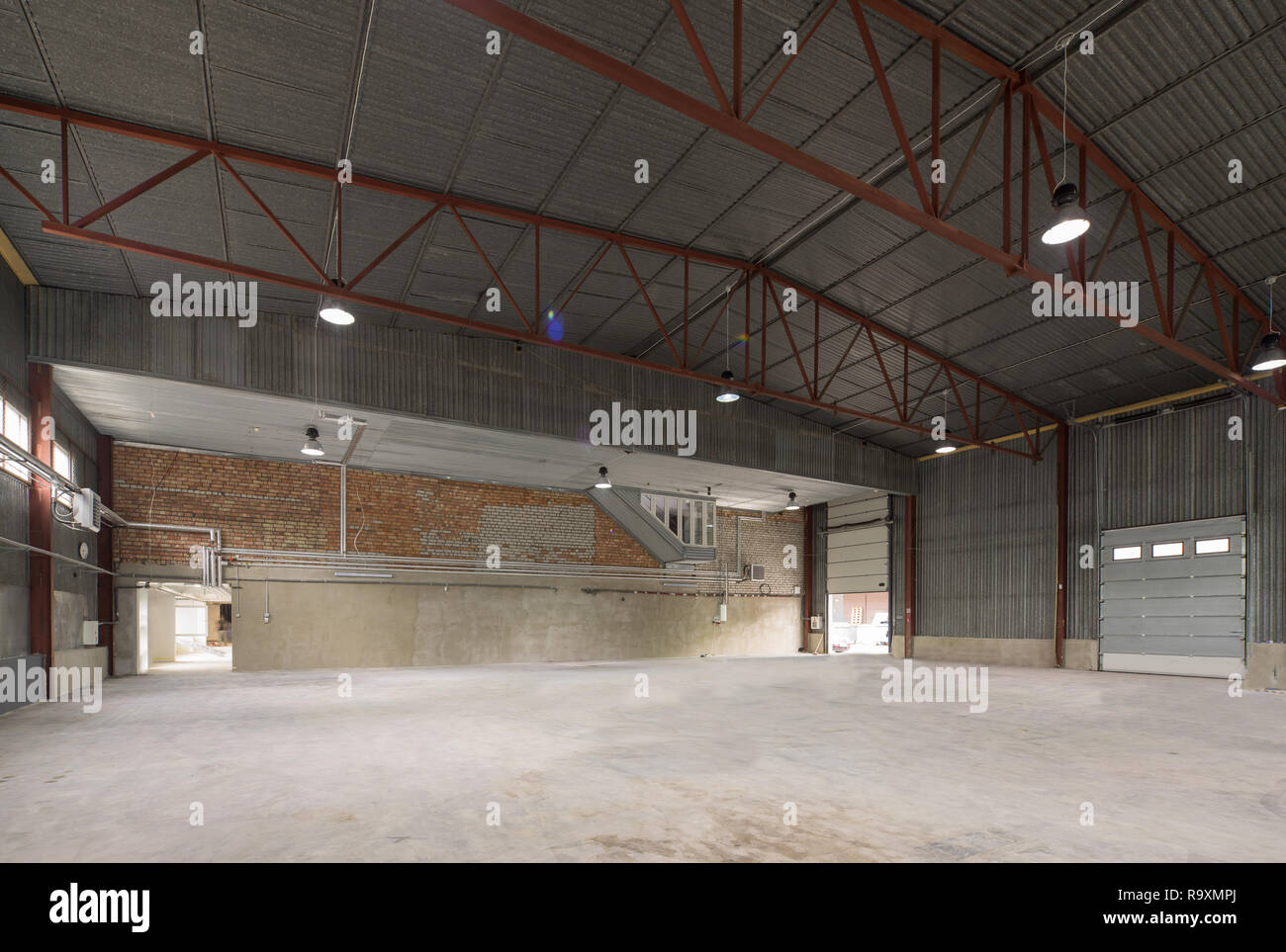 Hangar for storage. Industrial warehouse Stock Photo - Alamy