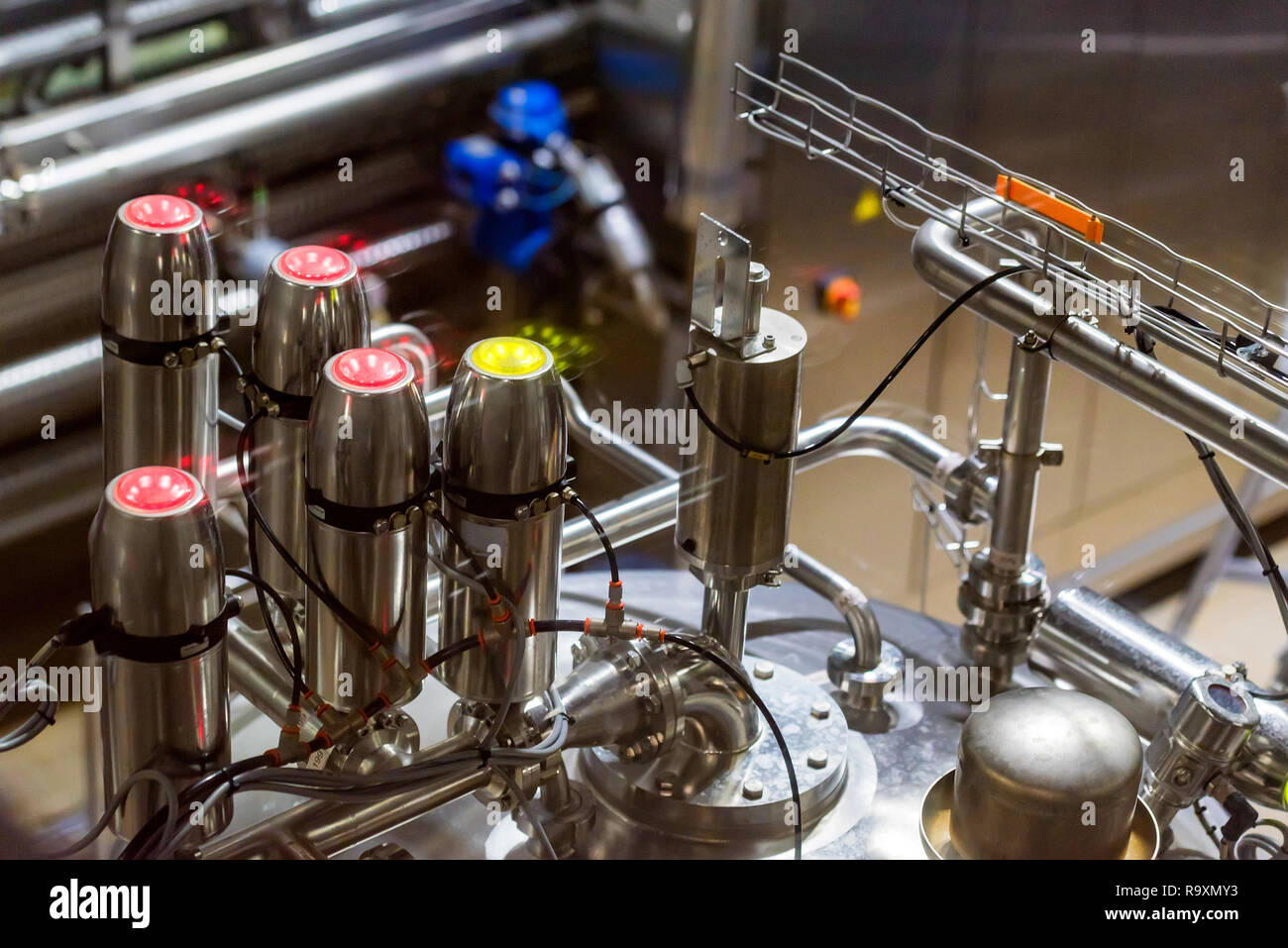 Close up reservoires and soft drinks factory interior Stock Photo - Alamy