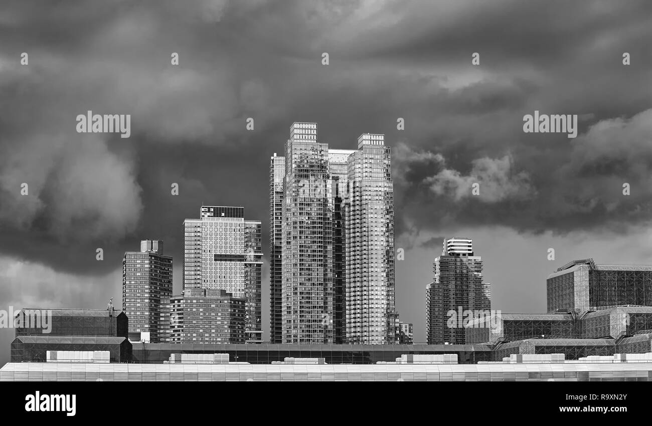 Dramatic sky over modern buildings in downtown New York, USA Stock ...