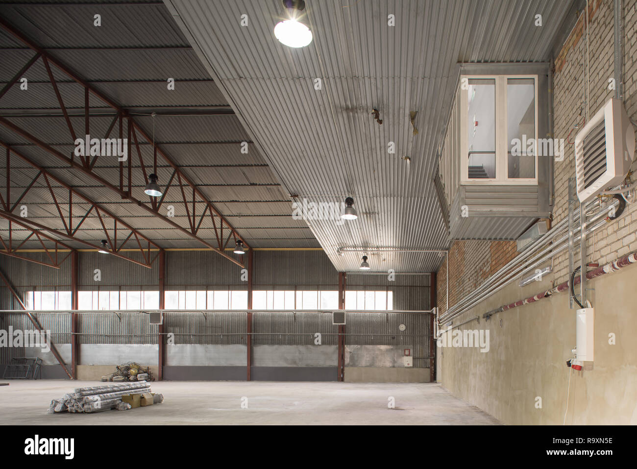 Hangar for storage. Industrial warehouse Stock Photo - Alamy