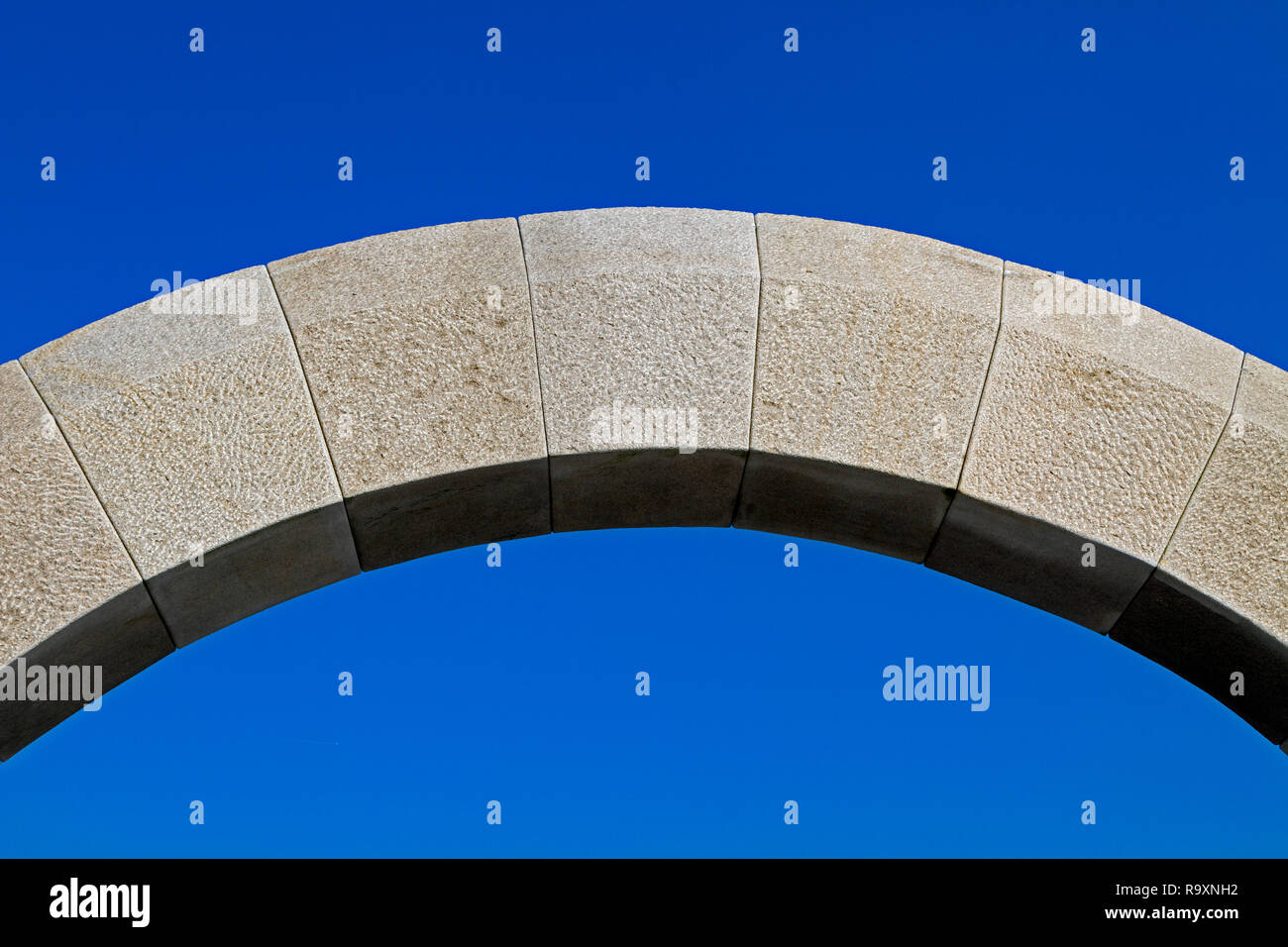 A section of a stone arch which forms part of the sea defences in ...