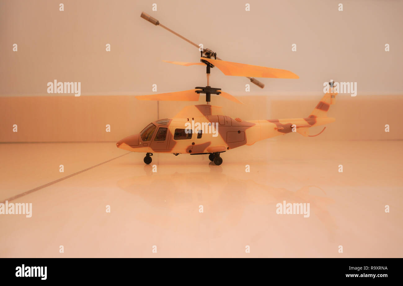 Cartoon helicopter placed on the floor wth cyan background Stock Photo ...
