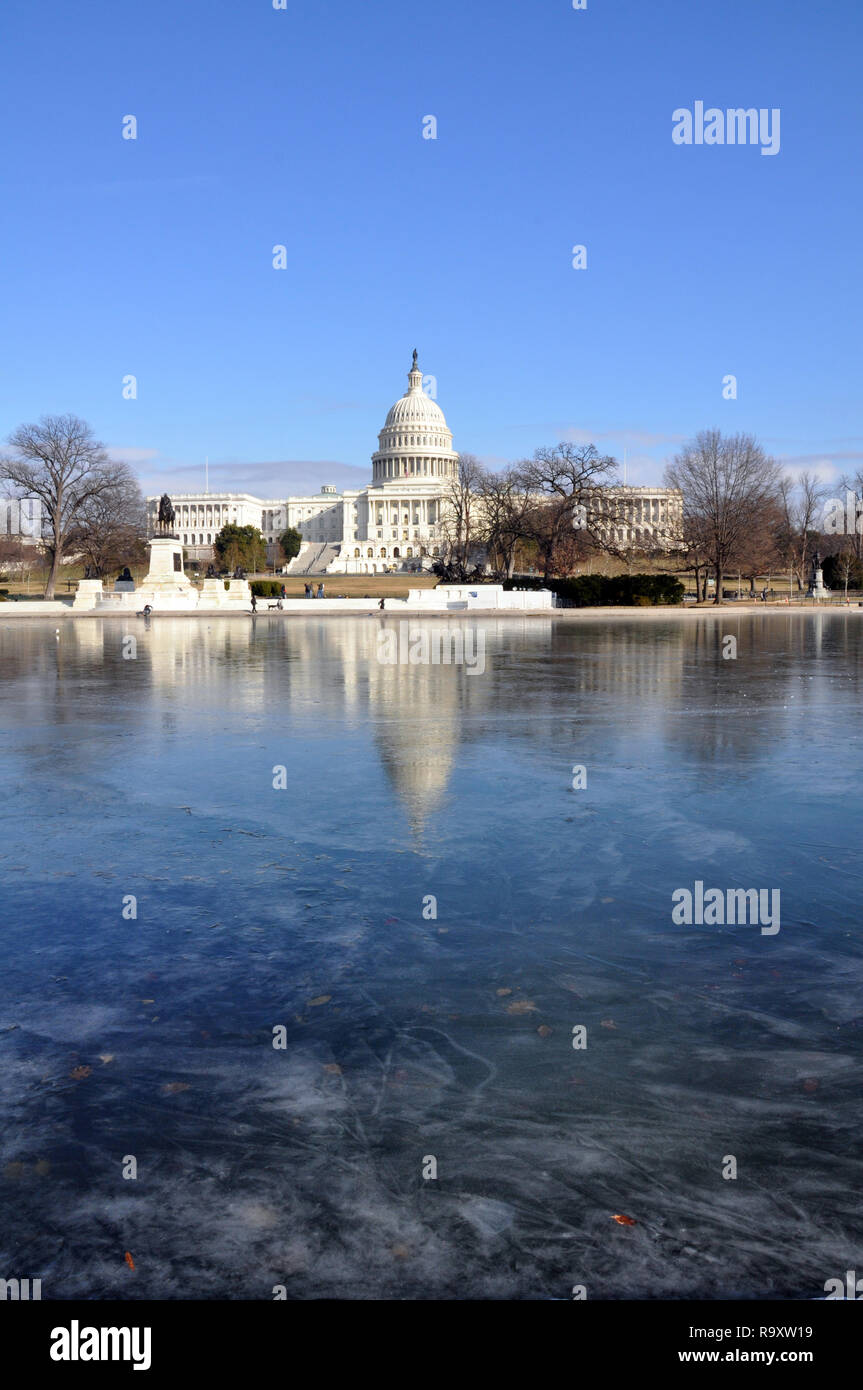 View of Frozen Reflecting Pool in front of US Capitol in Washington DC ...