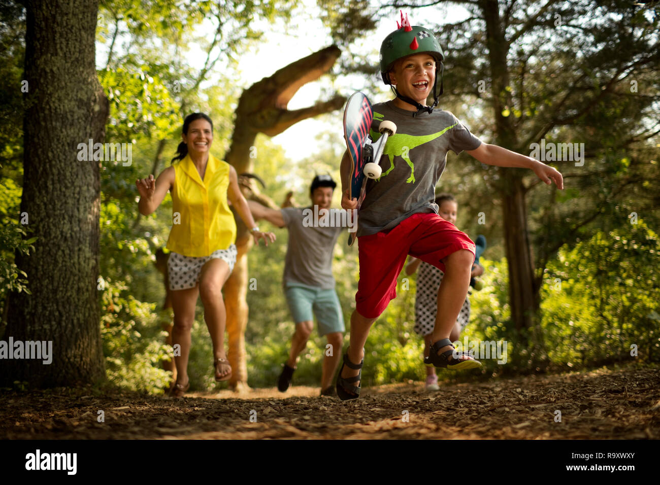 Happy woman playfully running hi-res stock photography and images - Alamy