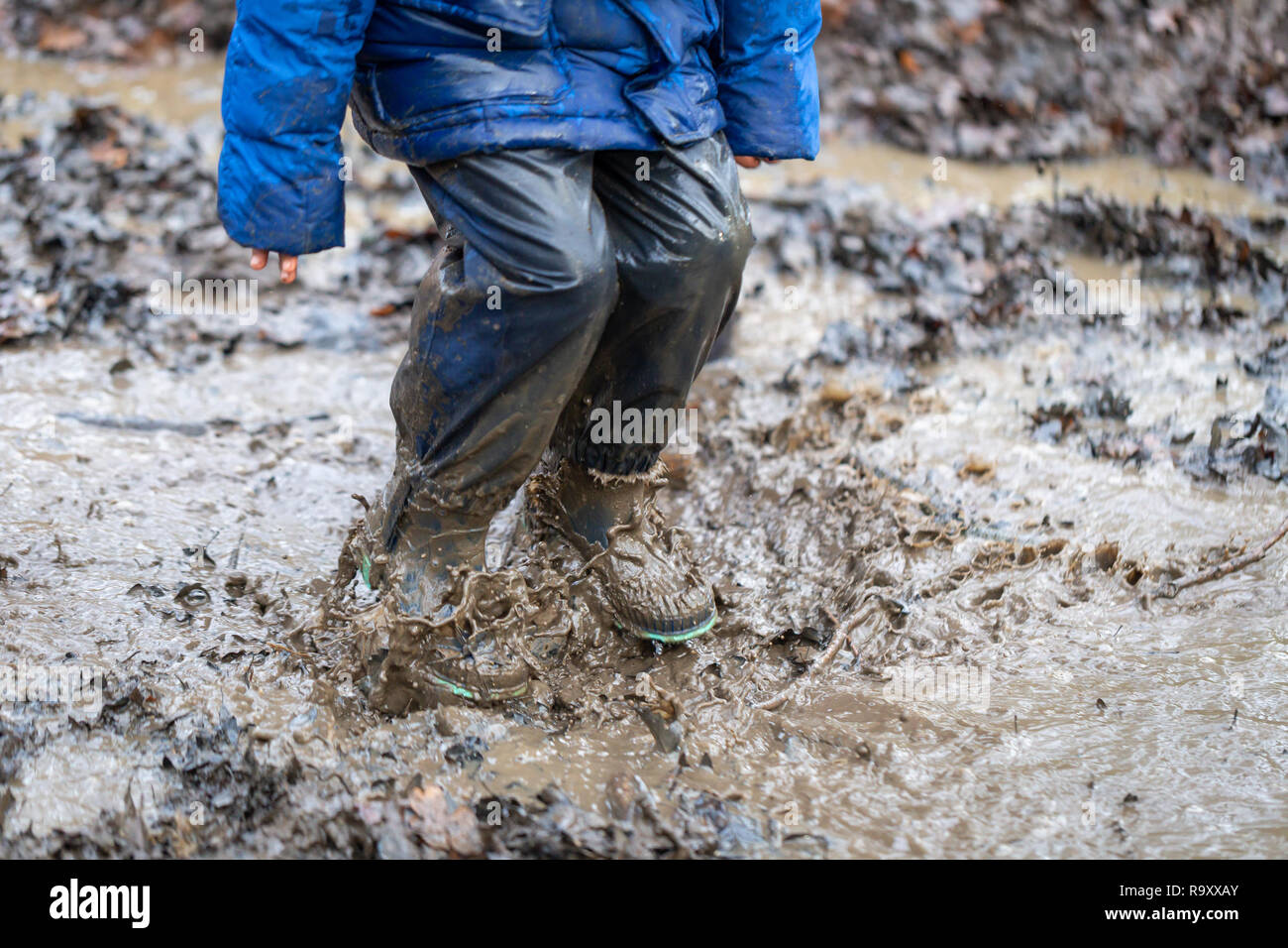 Playing in the mud hi-res stock photography and images - Alamy