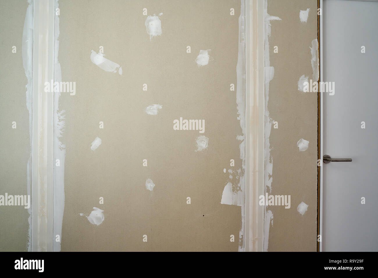 laminated plasterboard join tape plastering DIY detail Stock Photo - Alamy