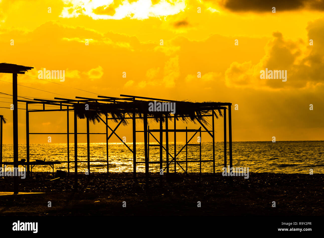 Beautiful sunset above the Black sea looking from the beach in Batumi ...