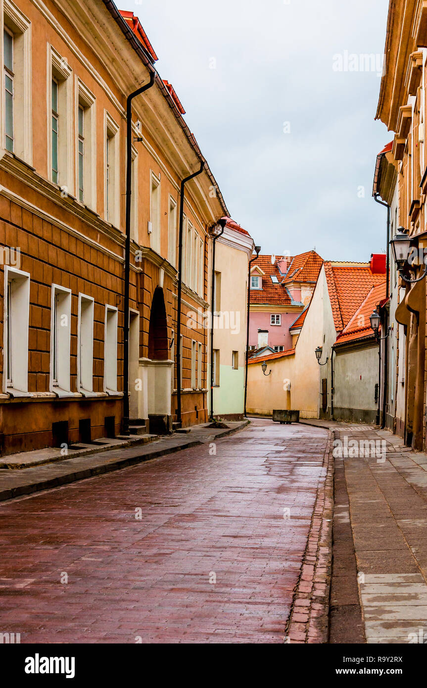 Stylish and cozy street in Old Town of Vilnius. Classical European ...
