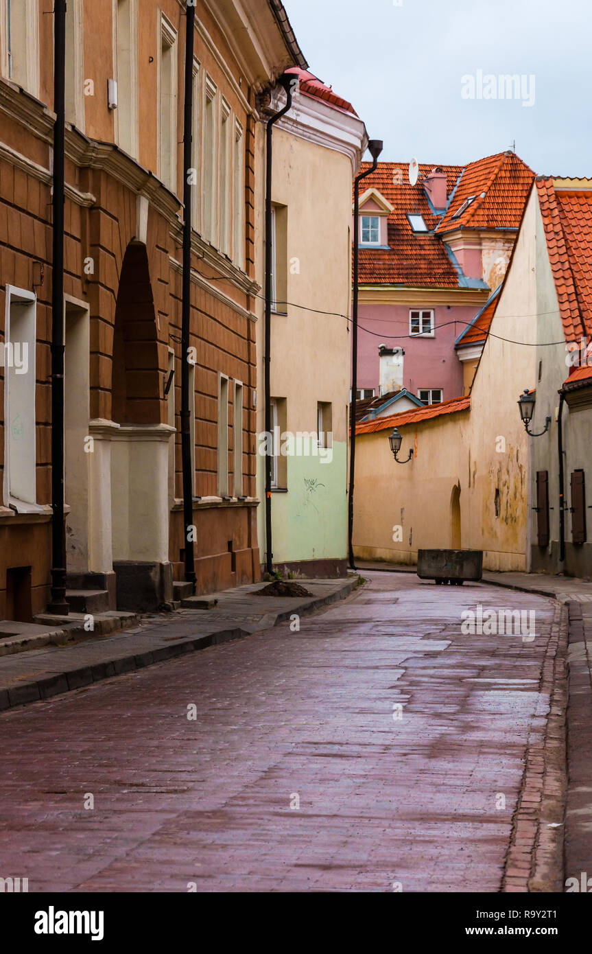 Stylish and cozy street in Old Town of Vilnius. Classical European ...