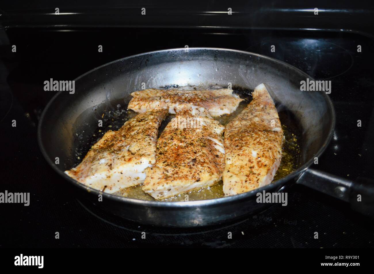 Pan seared snapper dinner Stock Photo - Alamy