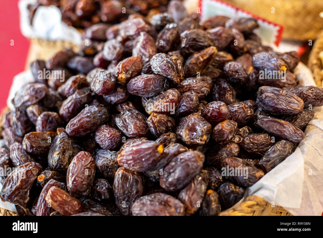 Raisins, dates and other candied fruits, sugar coated, for sale in a ...