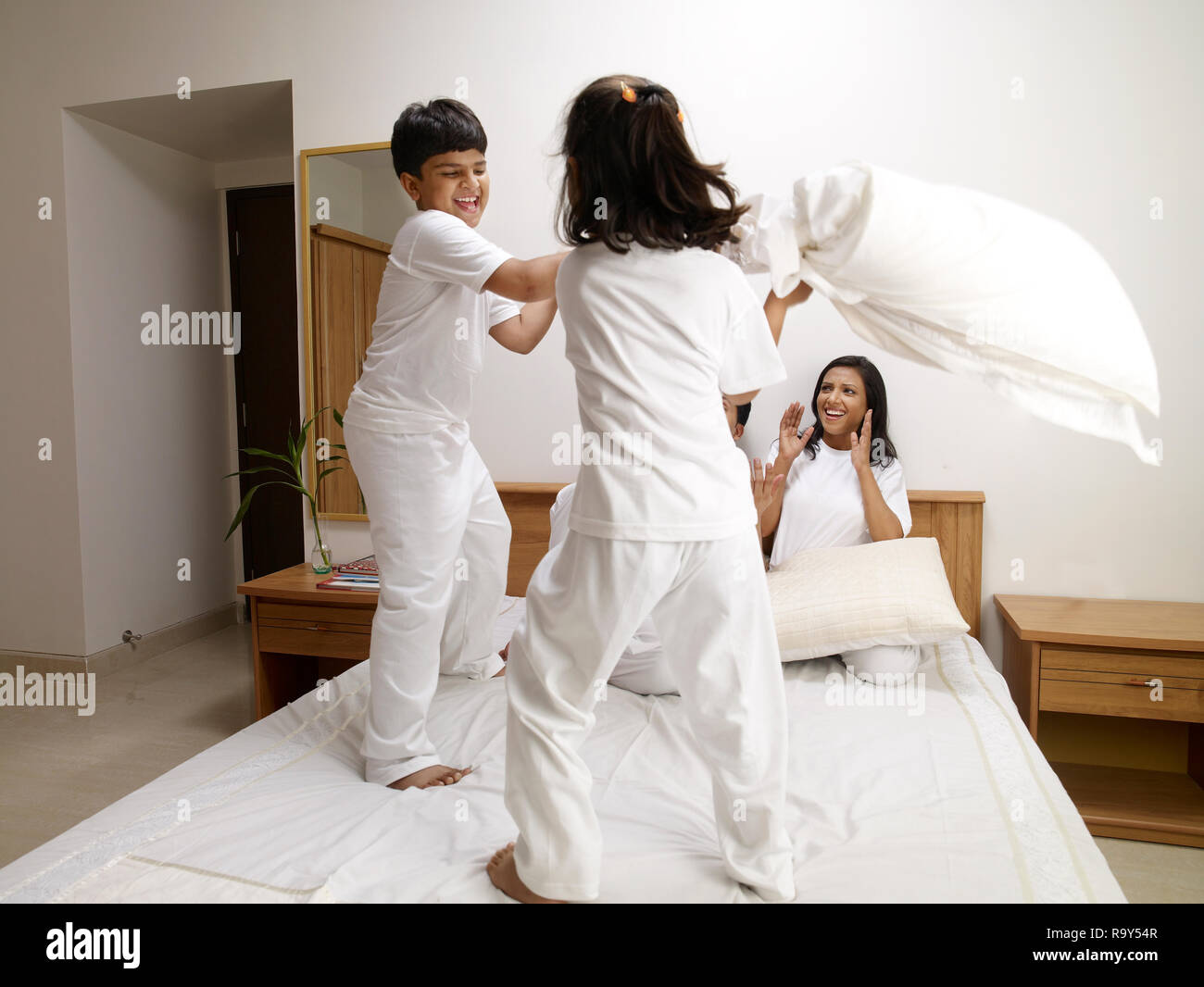 Girls playing in bedroom hi-res stock photography and images - Alamy