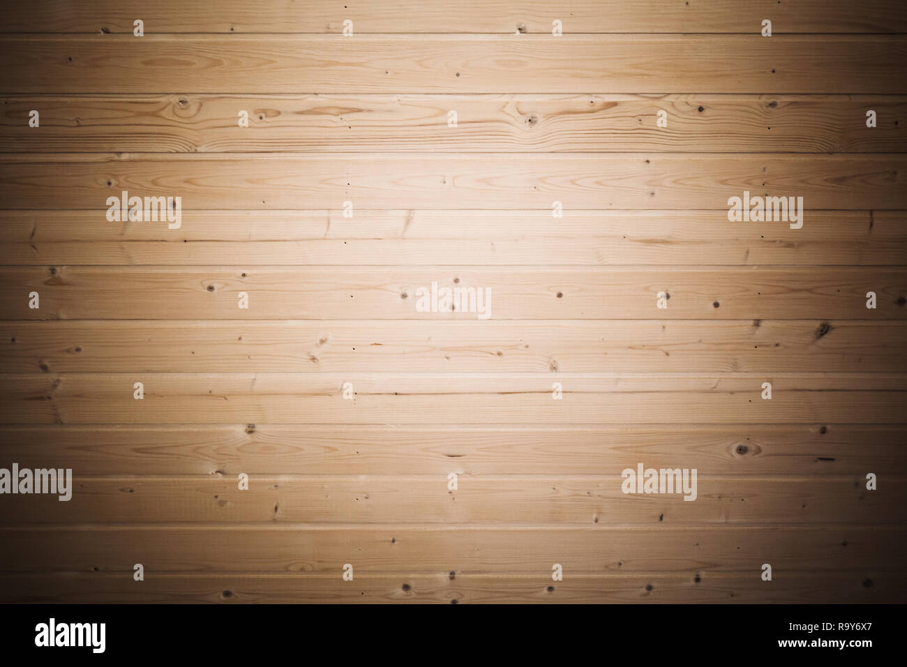 Background texture of wooden wall made of pine tree planks with spot ...