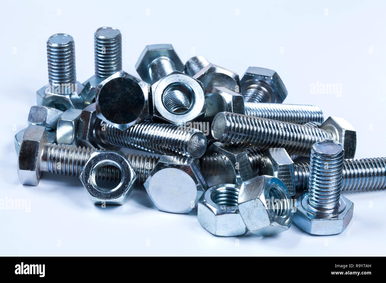 metal screw or bolt and nuts isolated on white background Stock Photo ...