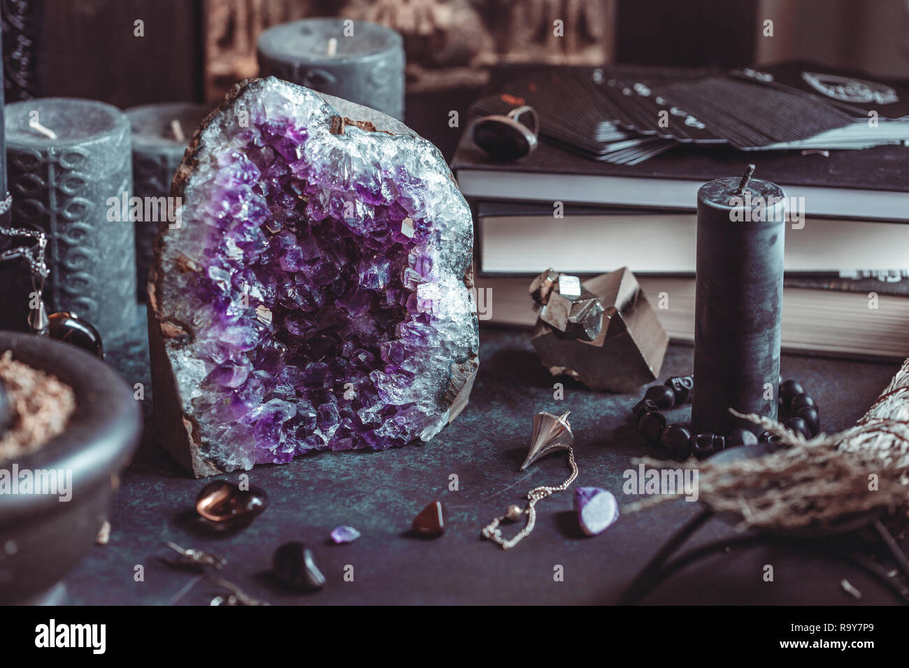 Amethyst Druze on a witch's altar for a magical ritual among crystals ...