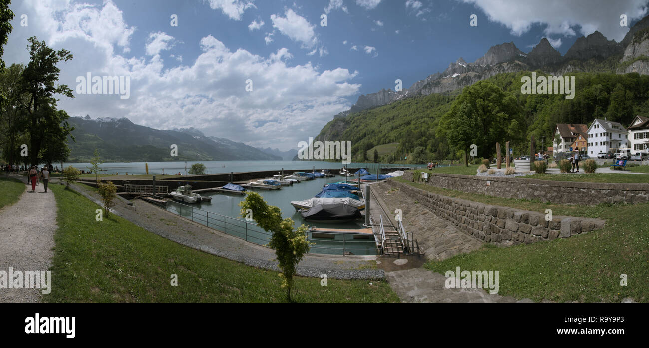 View of Walensee and harbour from the shore at Walenstadt, Swiss Alps ...