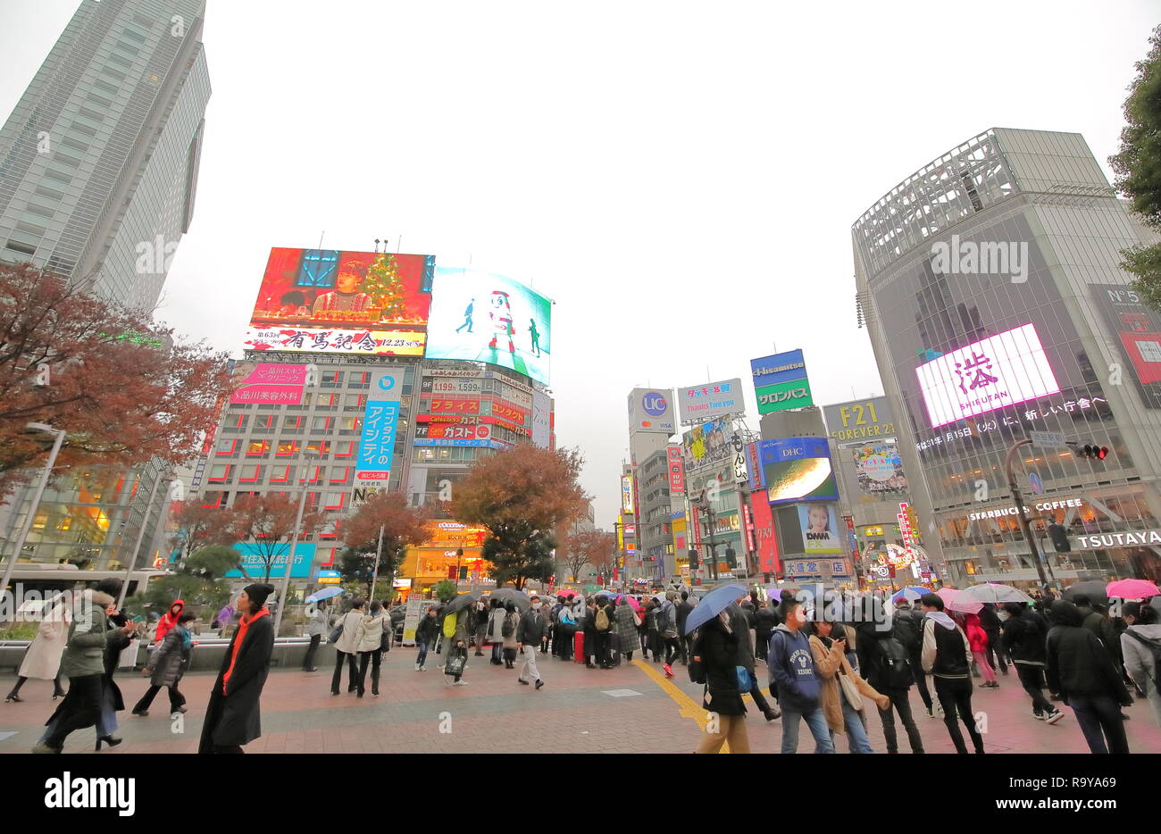 People visit busy Shibuya crossing in Shibuya Tokyo Japan Stock Photo ...