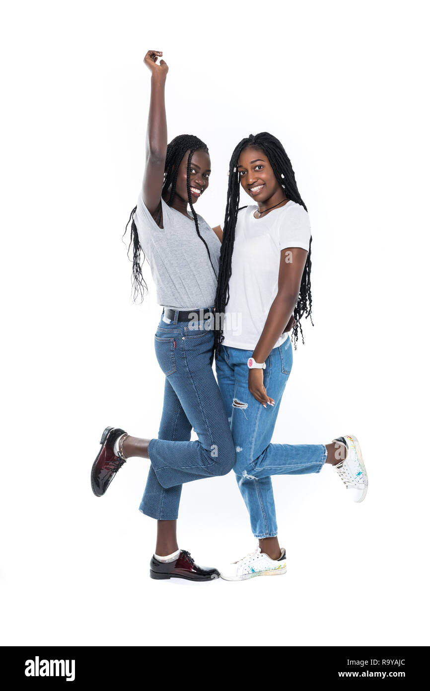 Full height of Two african woman standing isolated on white Stock Photo ...